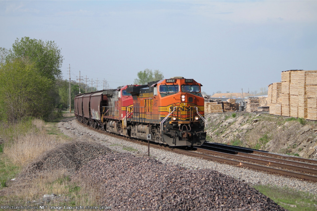 BNSF 4967 heads a grain train southbound for st louis,